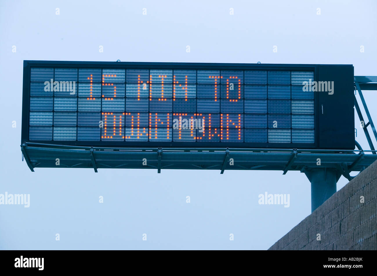 LED highway sign displays 15 minutes to downtown showing how much ...