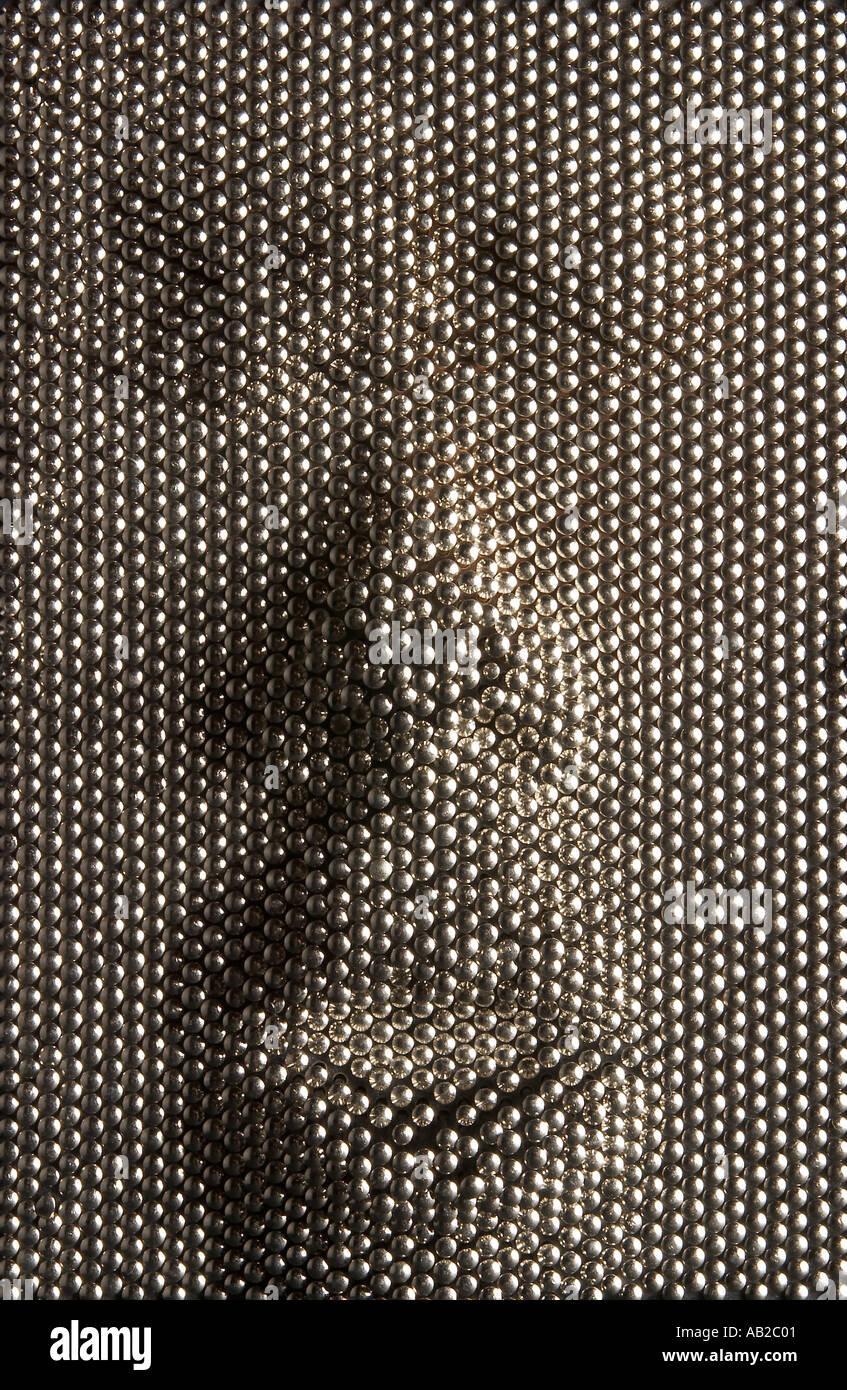 Pin array impression of a man s face Stock Photo - Alamy
