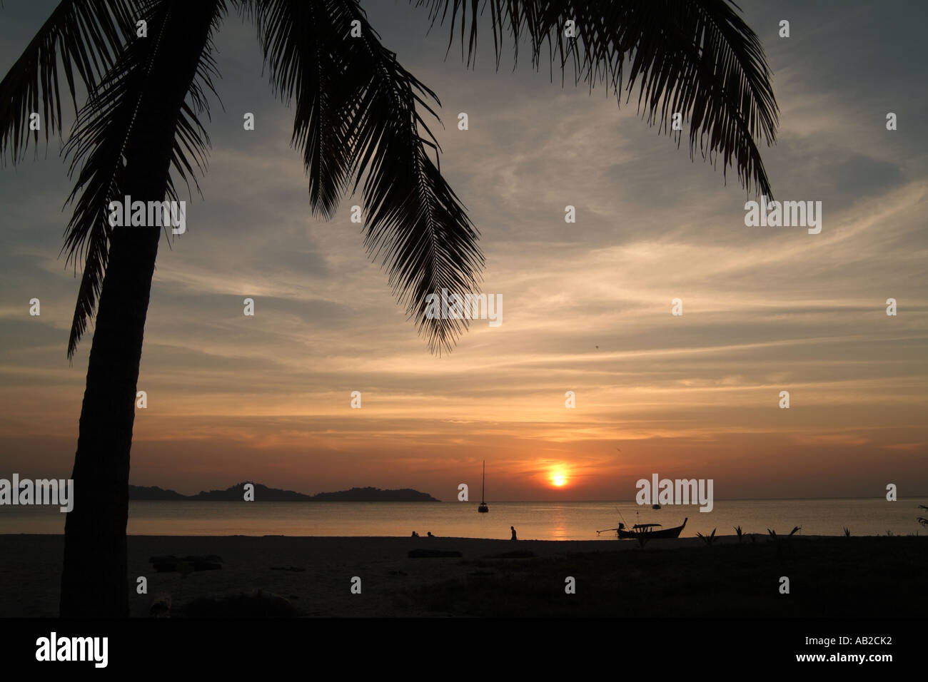 Thai beach sunset Stock Photo - Alamy