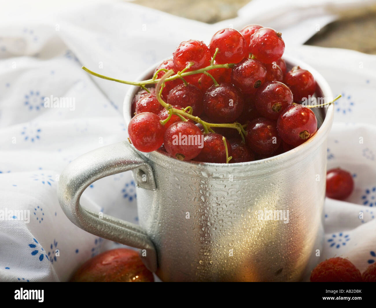 Redcurrants in metal cup FoodCollection Stock Photo - Alamy