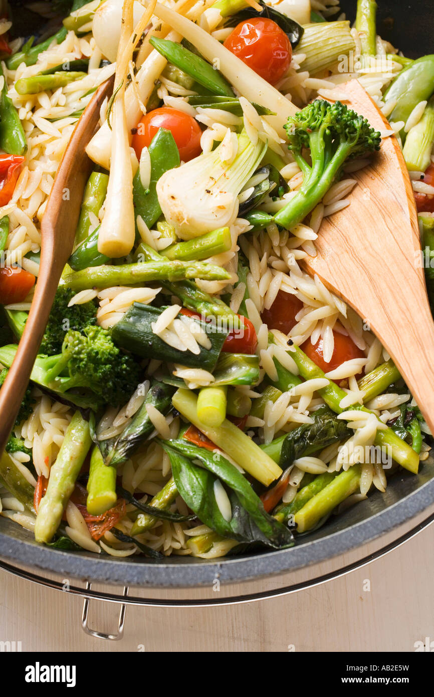 Orzo rice shaped pasta with vegetables overhead view FoodCollection ...