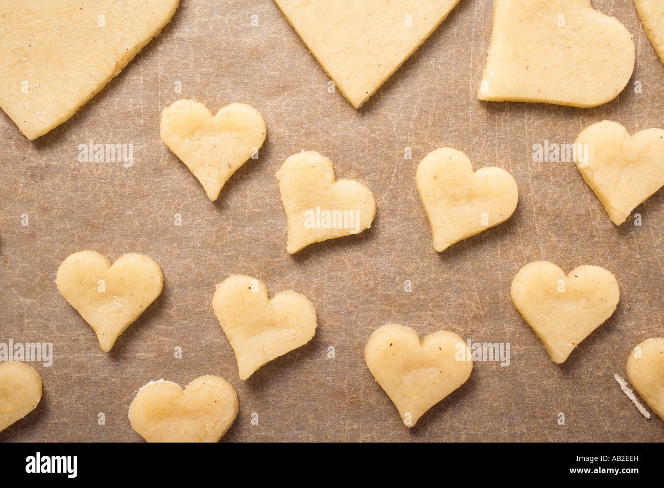 Cut out biscuits on baking parchment FoodCollection Stock Photo - Alamy