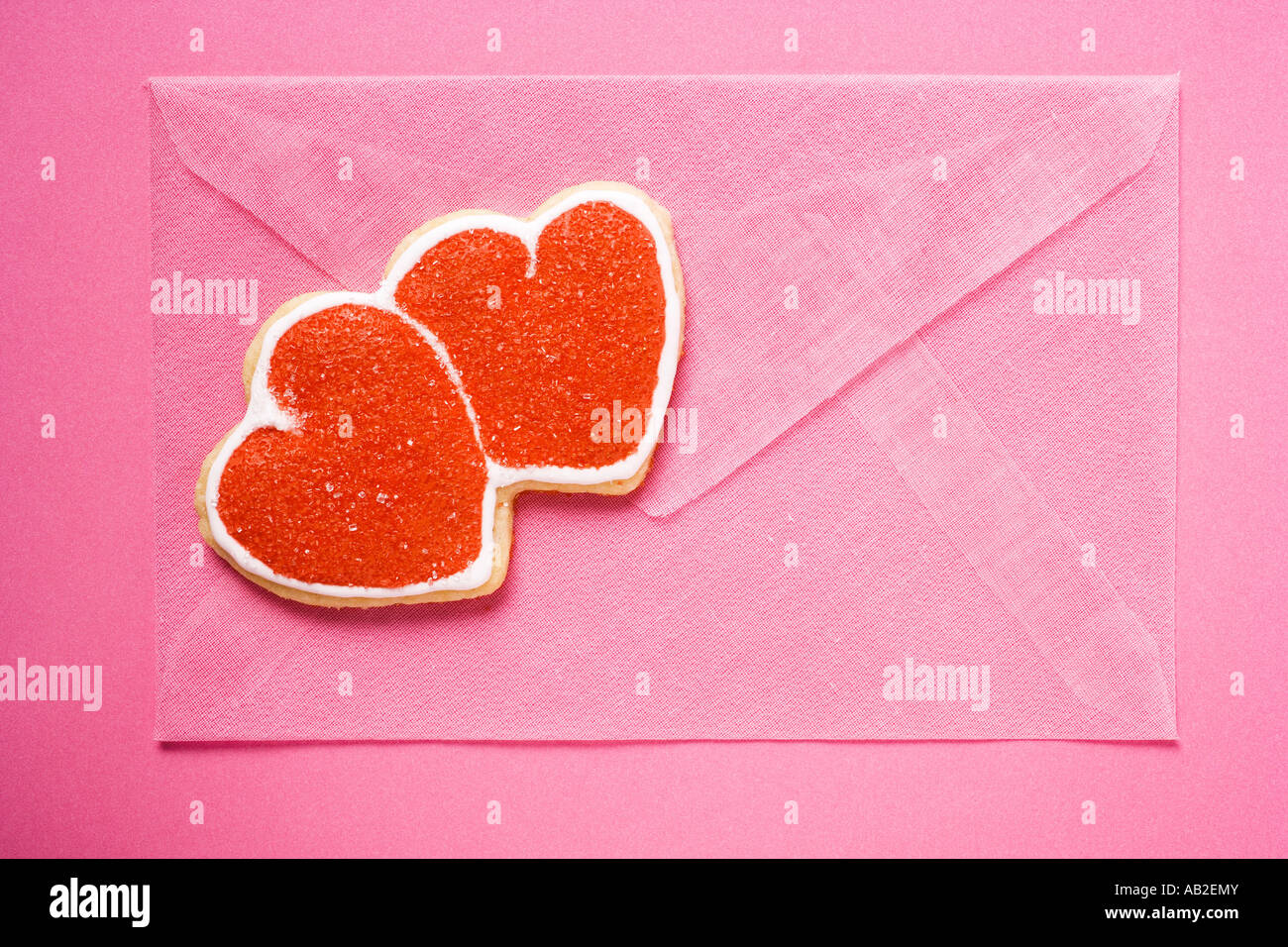 Pink envelope with red double heart shaped biscuit FoodCollection Stock ...