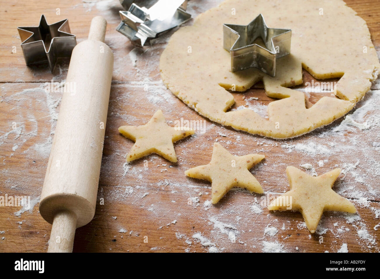 Cutting out star shaped biscuits FoodCollection Stock Photo - Alamy
