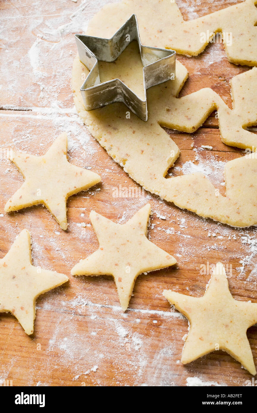 Cutting out star shaped biscuits FoodCollection Stock Photo - Alamy