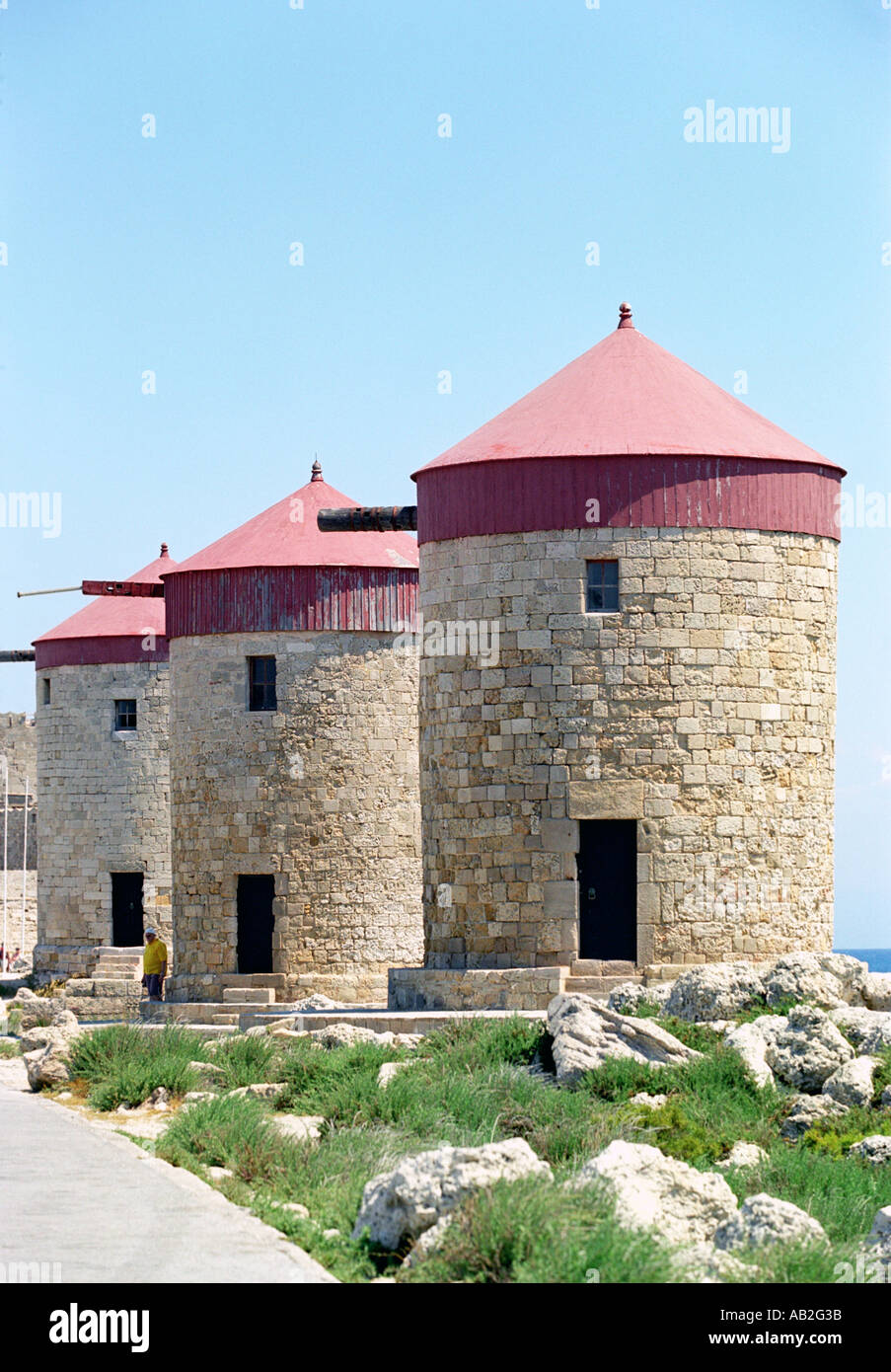 Traditional old stone windmills at Rhodes Town harbour Greek Islands ...