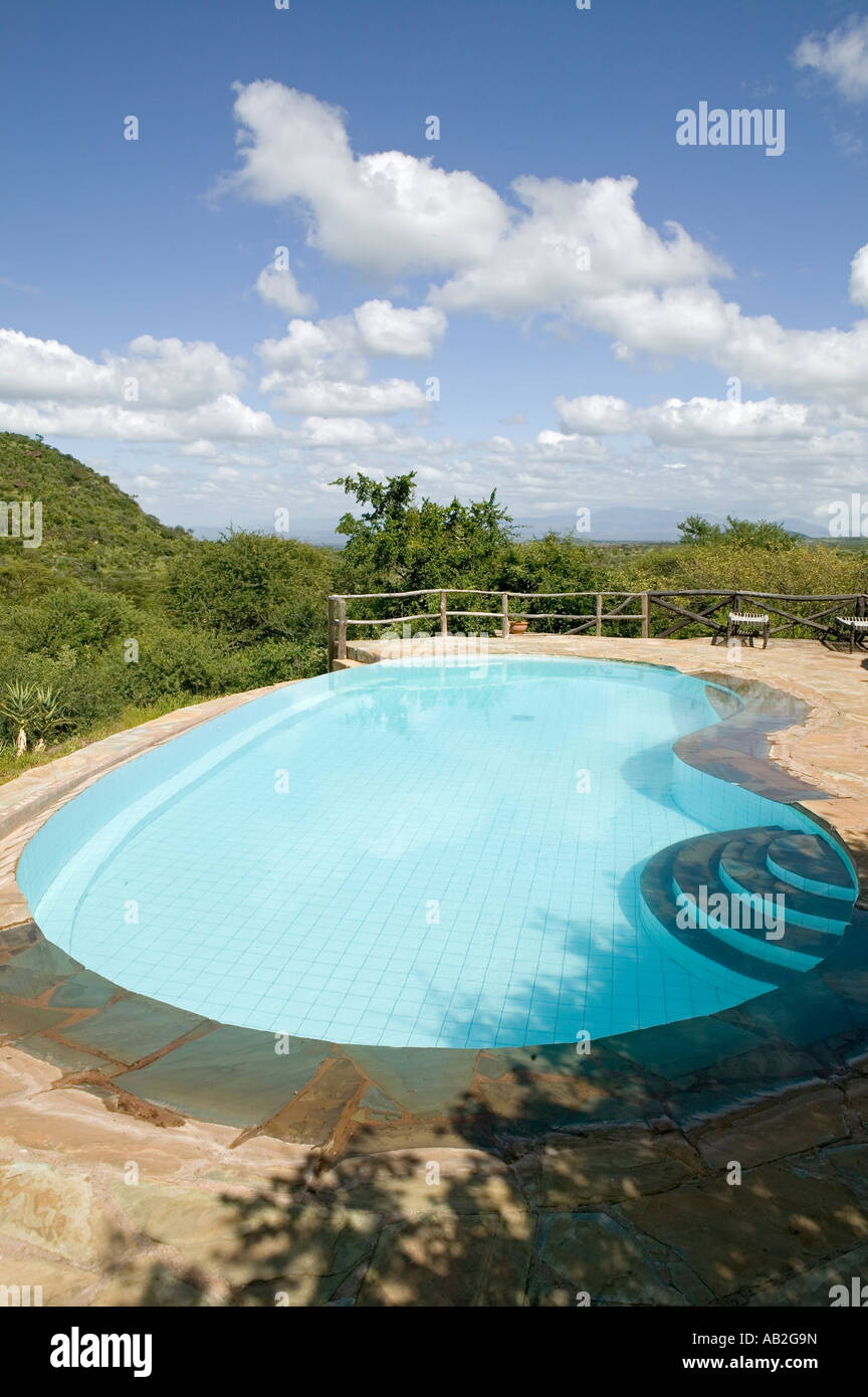 Swimming pool with turquoise water surrounded by the hills of North ...