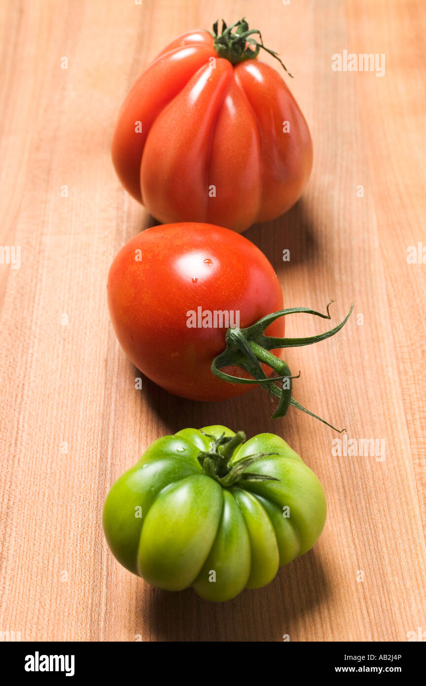 Three tomatoes FoodCollection Stock Photo - Alamy