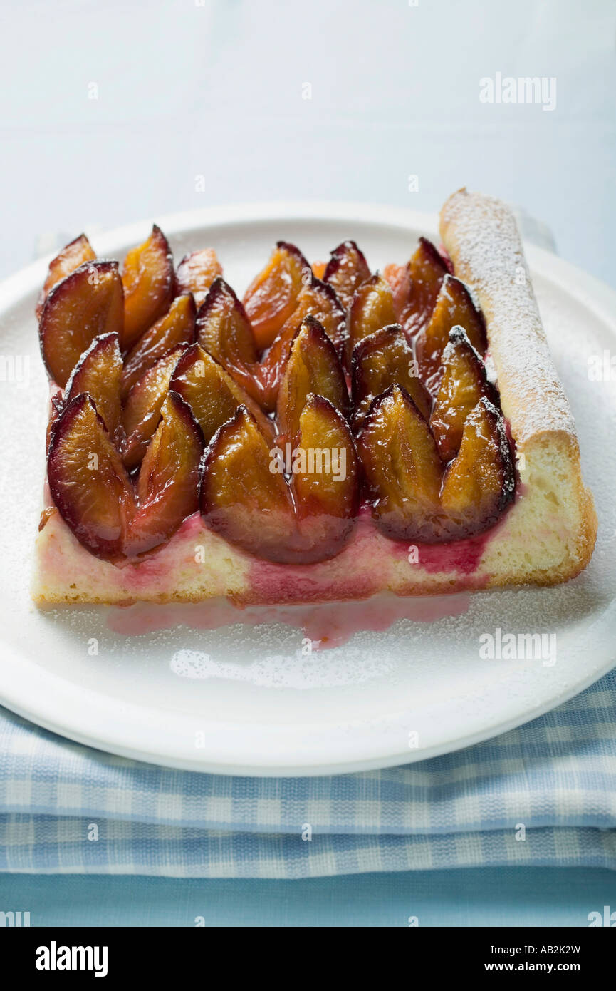 A piece of damson cake Zwetschgendatschi FoodCollection Stock Photo - Alamy