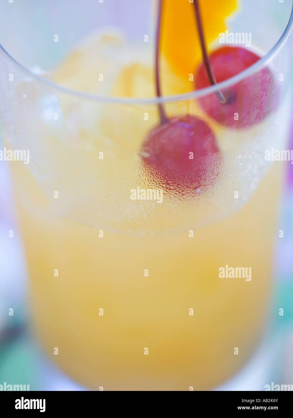 Fruit cocktail with cherries and lemon peel FoodCollection Stock Photo ...