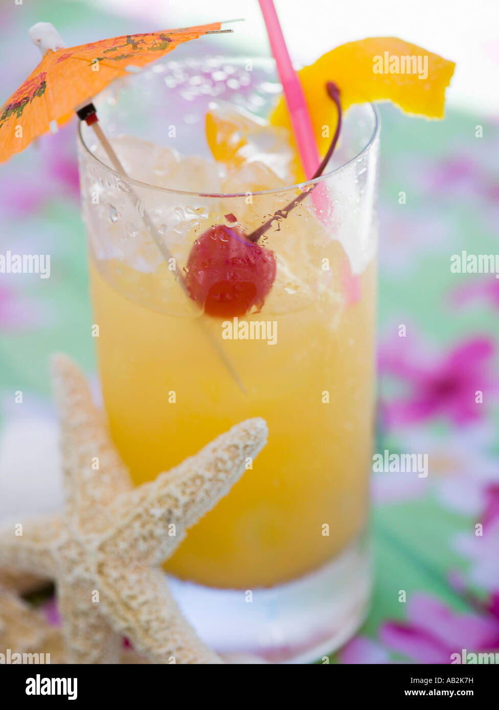 Fruit cocktail with cherry and lemon peel FoodCollection Stock Photo ...
