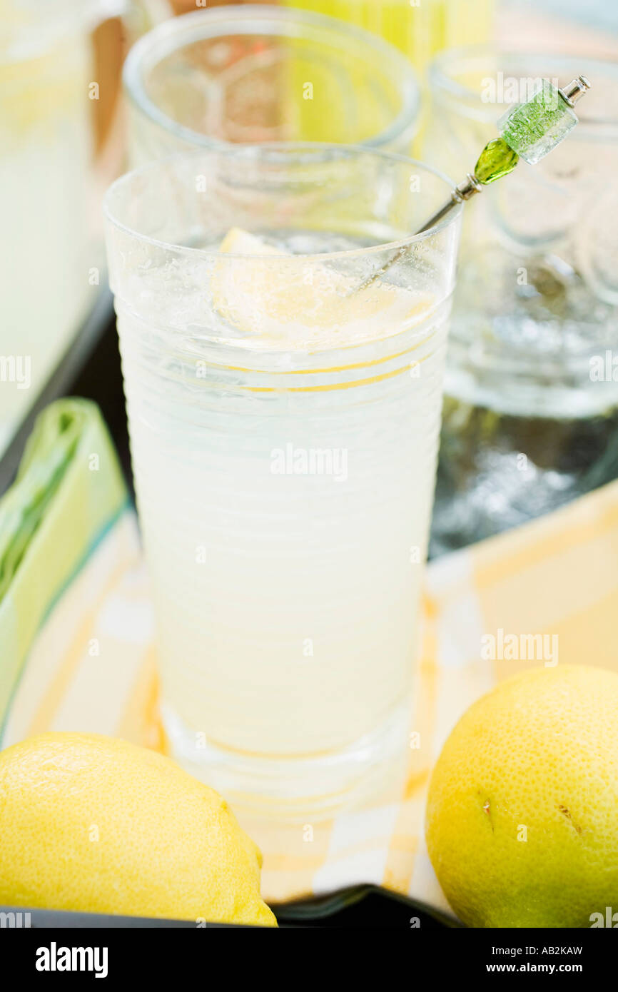 A glass of lemonade and lemons FoodCollection Stock Photo - Alamy