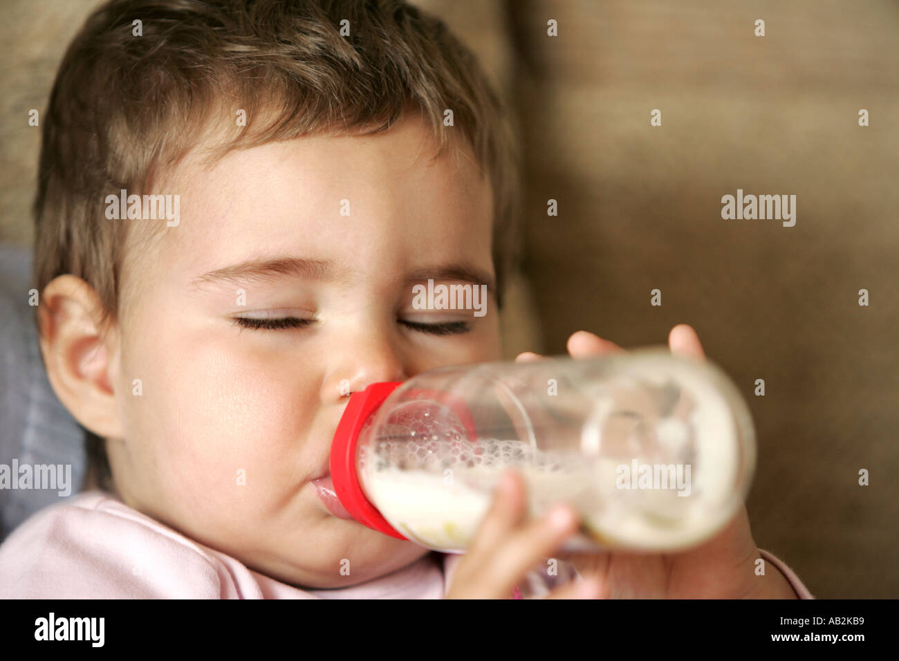 bottle fed baby girl baby milk drink drinking slipping slip enjoy ...