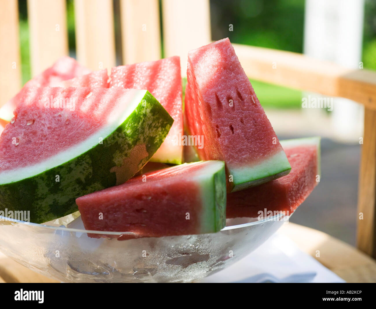 Watermelon wedges in a bowl of ice cubes FoodCollection Stock Photo - Alamy