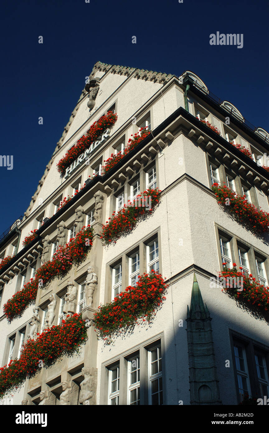 Building with window boxes Munich Germany Stock Photo - Alamy