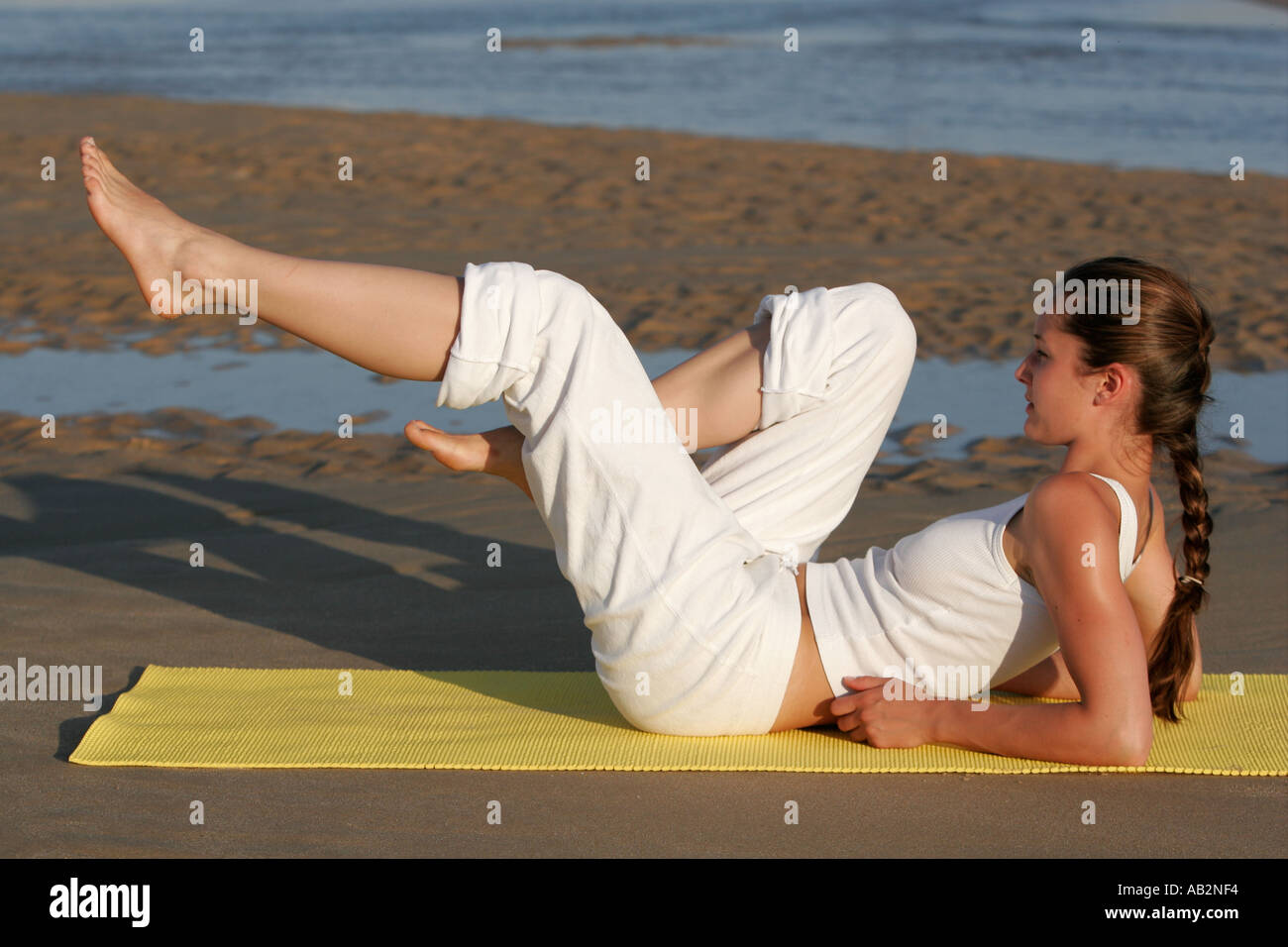young woman excercising outdoors Stock Photo - Alamy