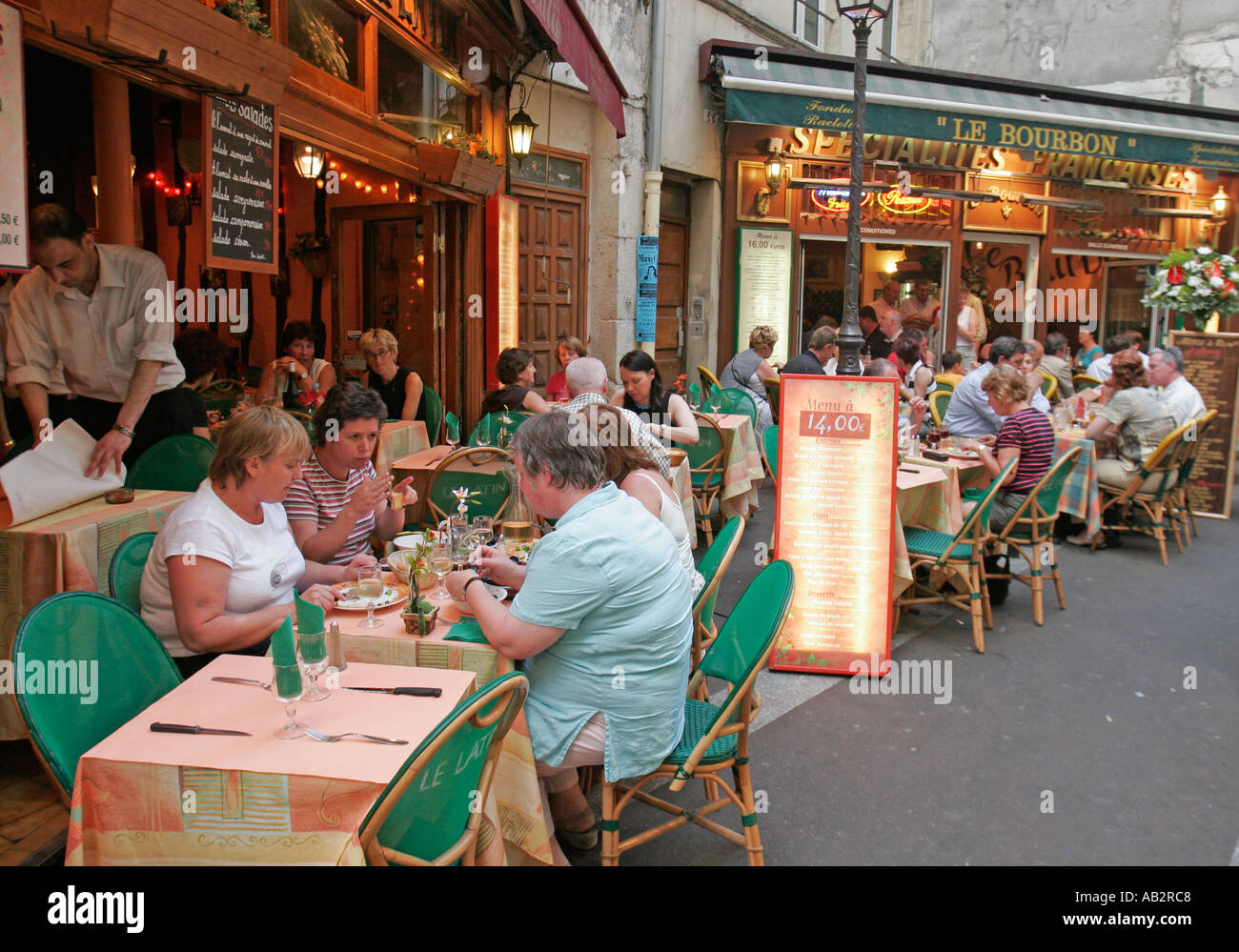 tourist dinning on street in paris france Stock Photo - Alamy