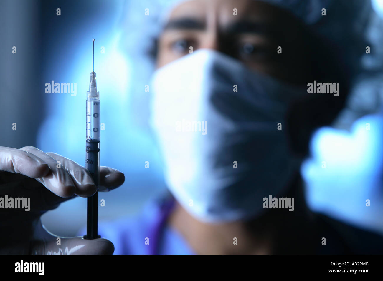 Doctor with syringe Stock Photo - Alamy