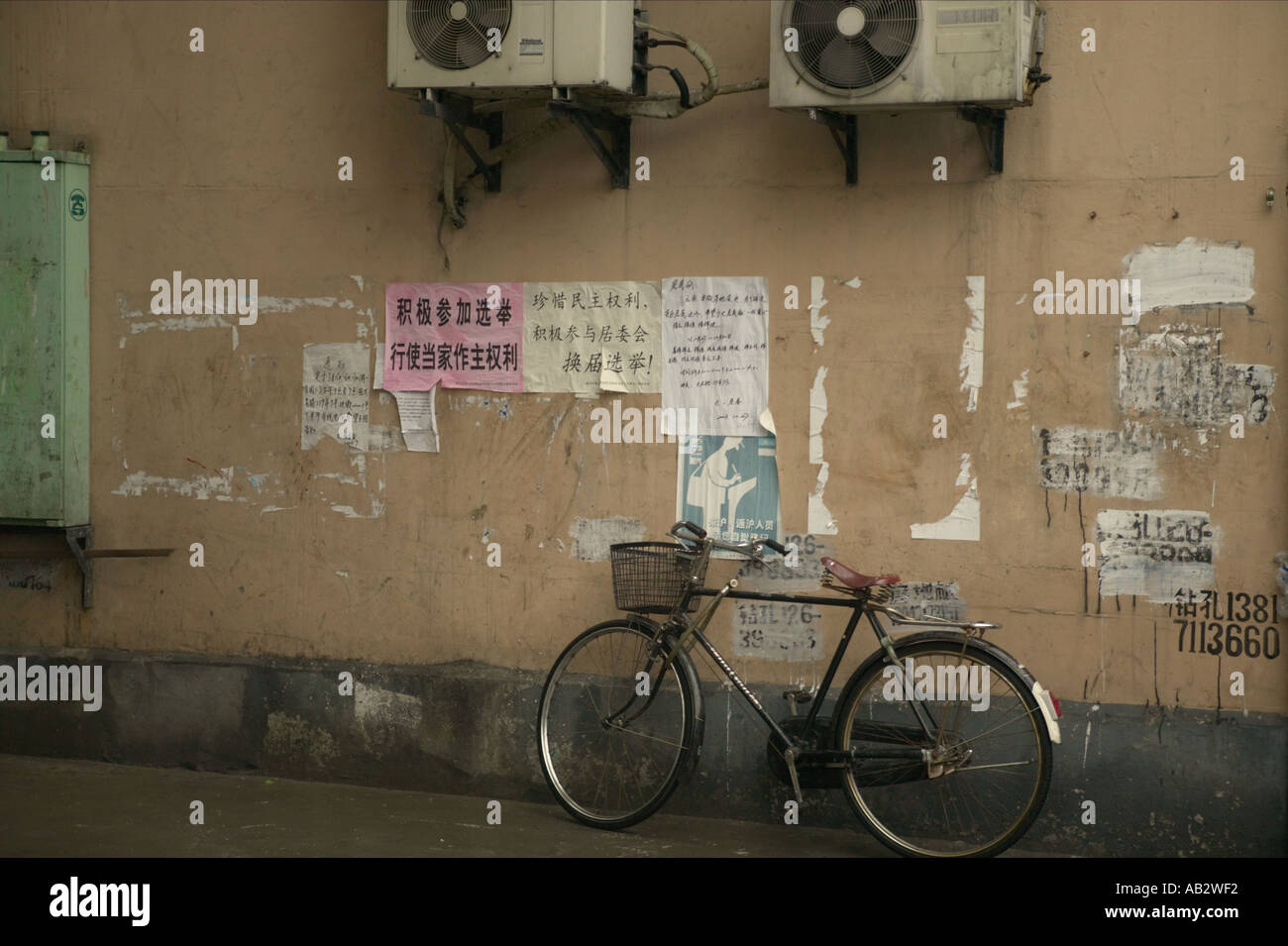 Bike propped against a wall hi-res stock photography and images - Alamy