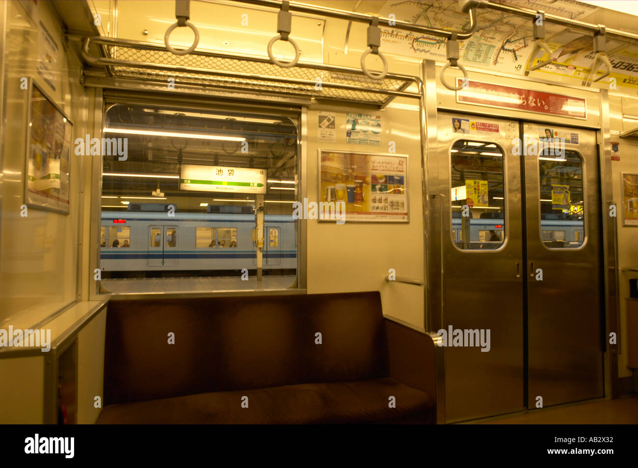 The inside of a train in Tokyo Stock Photo - Alamy