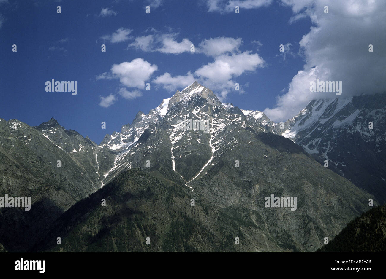 A view towards the Kinnaur Kailash mountain range from Kalpa Himachal ...