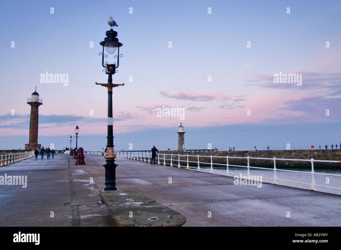 Sunset on Whitby Pier Stock Photo - Alamy