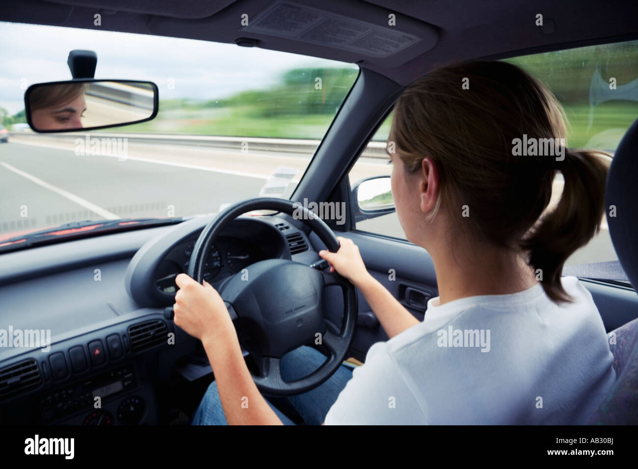 Woman driving car uk hi-res stock photography and images - Alamy