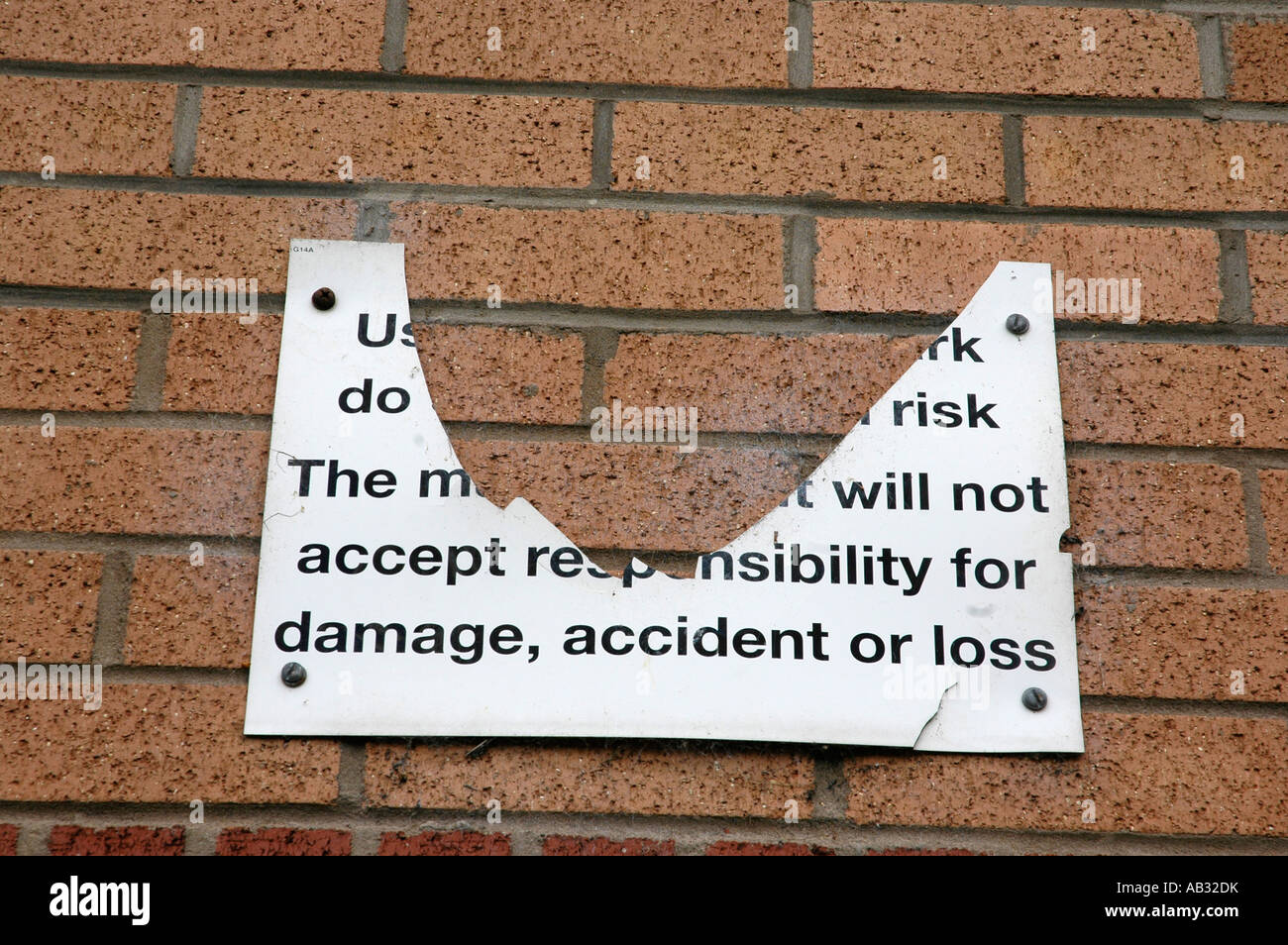 Warning Sign damaged by Vandals Stock Photo - Alamy