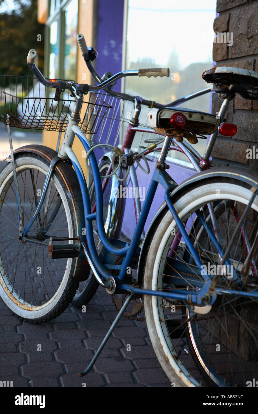 Two vintage bicycles on sidewalk Stock Photo - Alamy