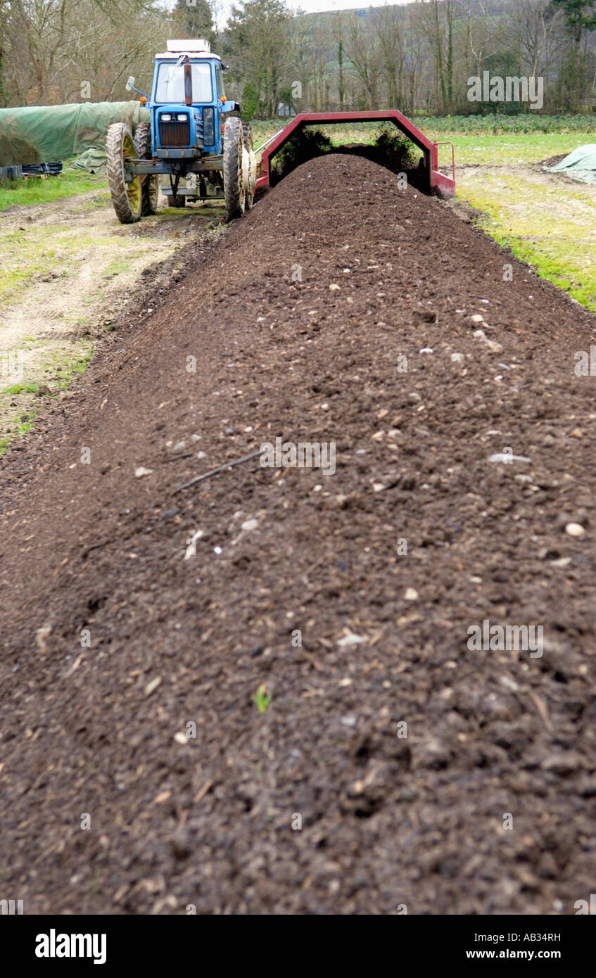 Tractor turning microbial compost heap on Blaen Camel Organic Farm ...