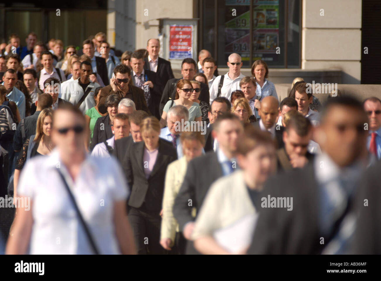 Commuters on London Bridge in the evening rush hour City of London ...