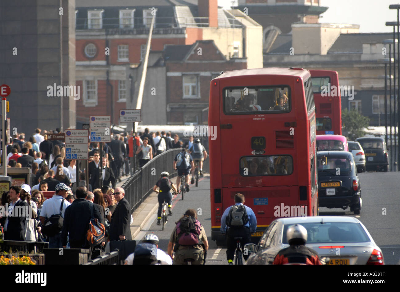 Commuters on London Bridge in the evening rush hour City of London ...