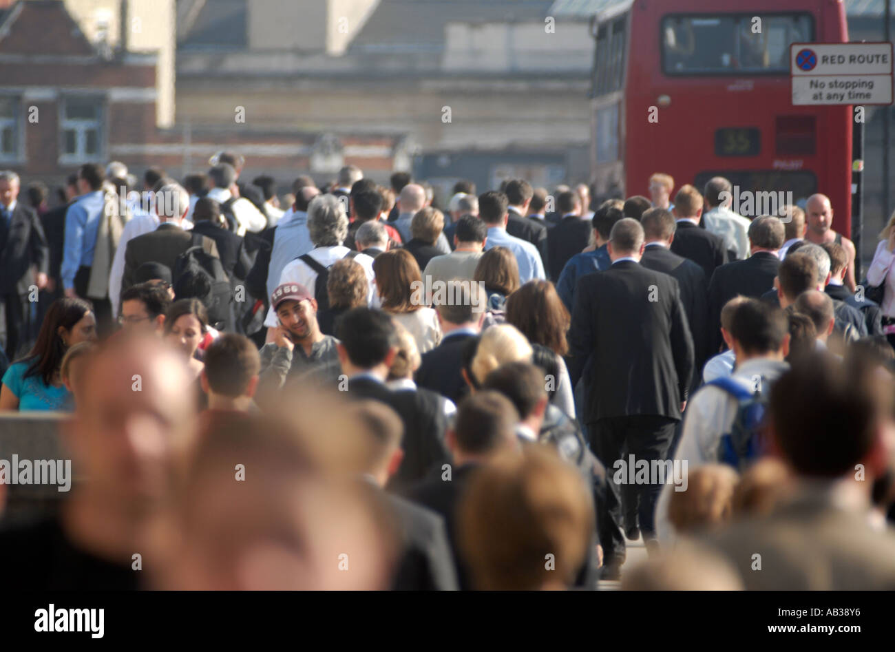 Commuters on London Bridge in the evening rush hour City of London ...