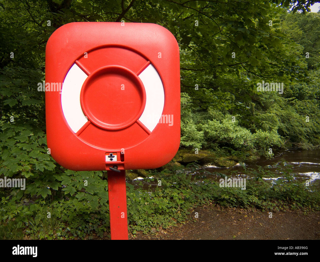 Red safety life ring on post in country side near a river Stock Photo ...