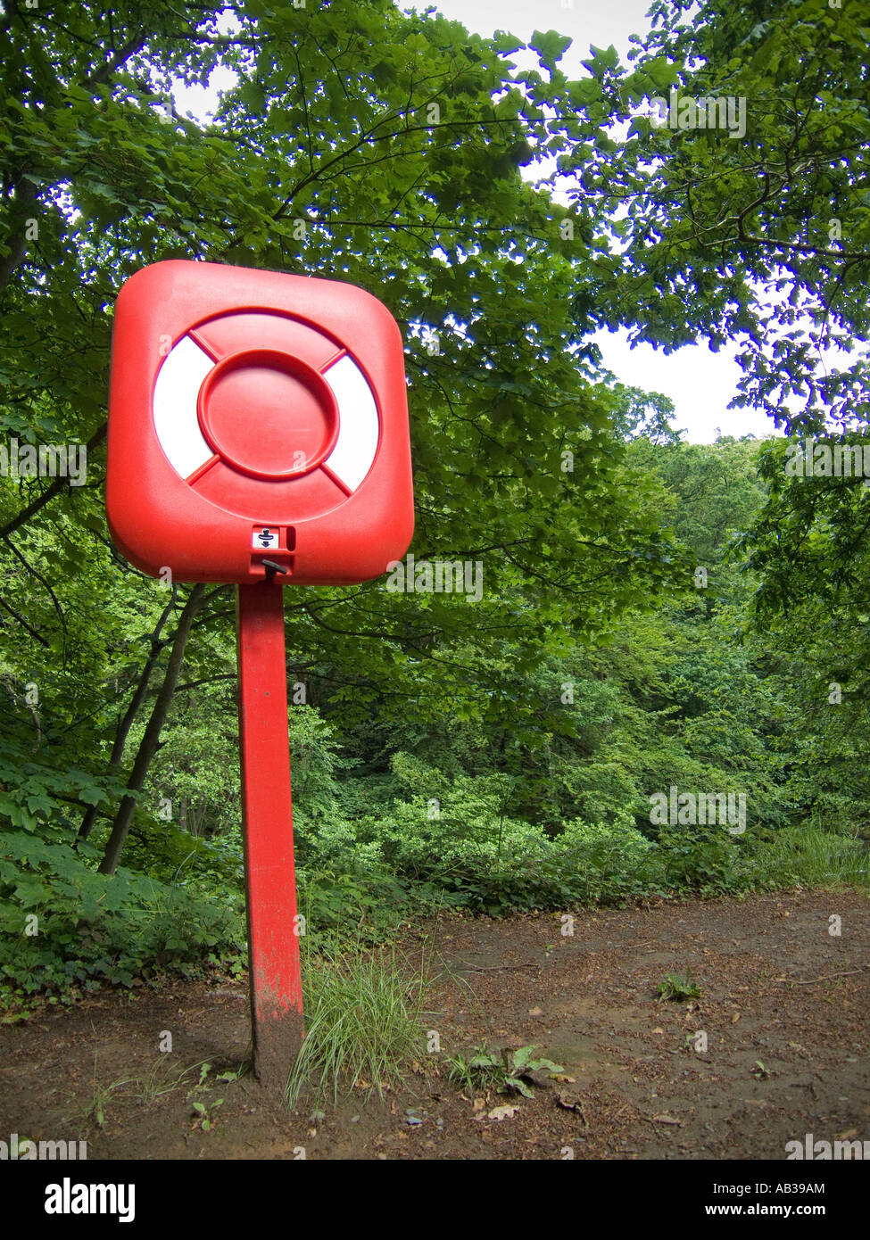Red safety life ring on post in country side near a river Stock Photo ...