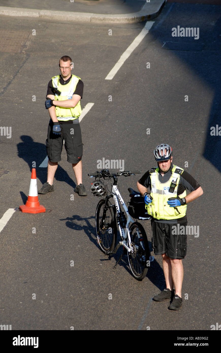 Police cyclists on traffic duty in the City of London Stock Photo - Alamy