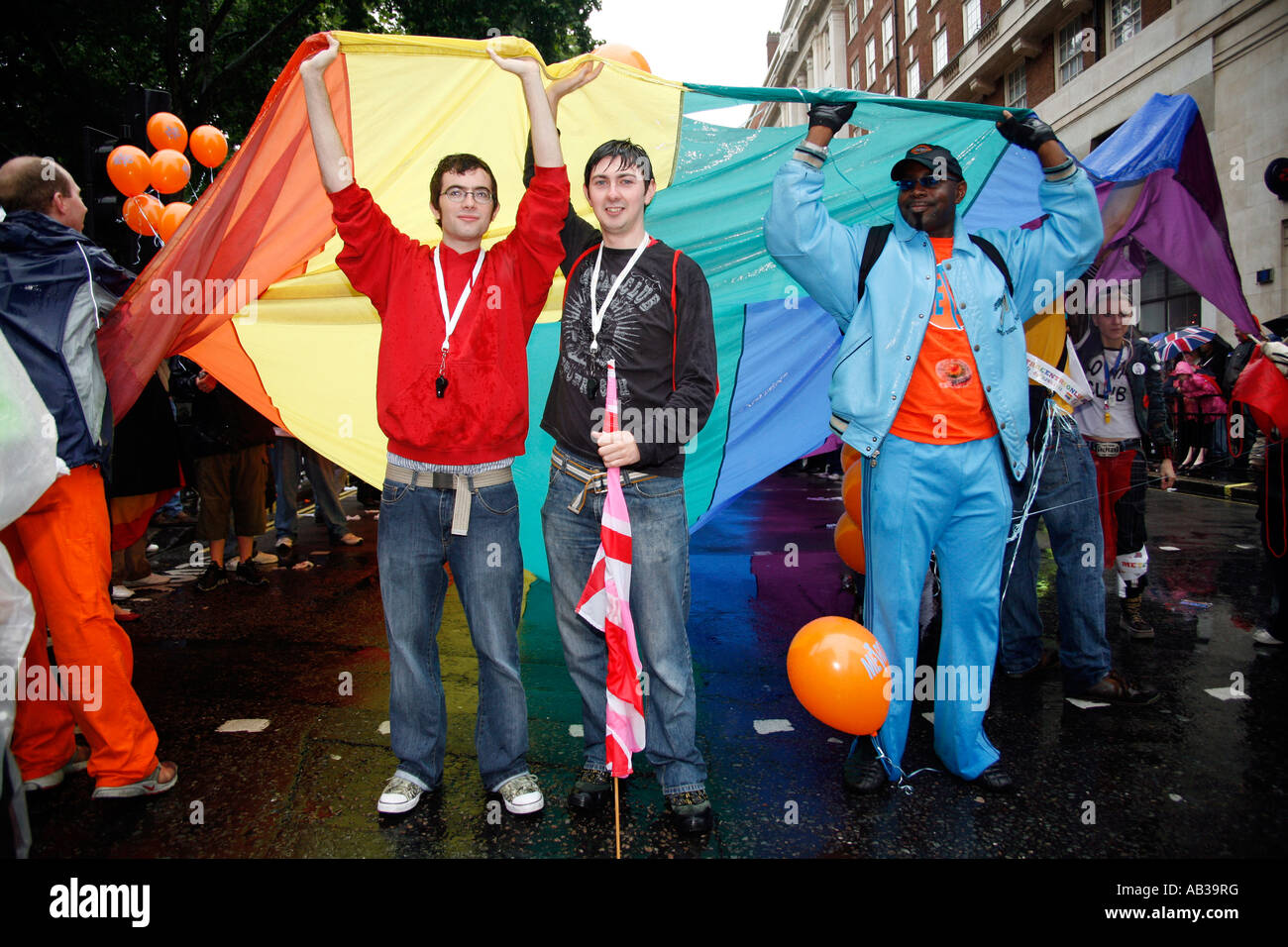 Carrying the Rainbow Flag 2007 London Gay Pride March Stock Photo - Alamy