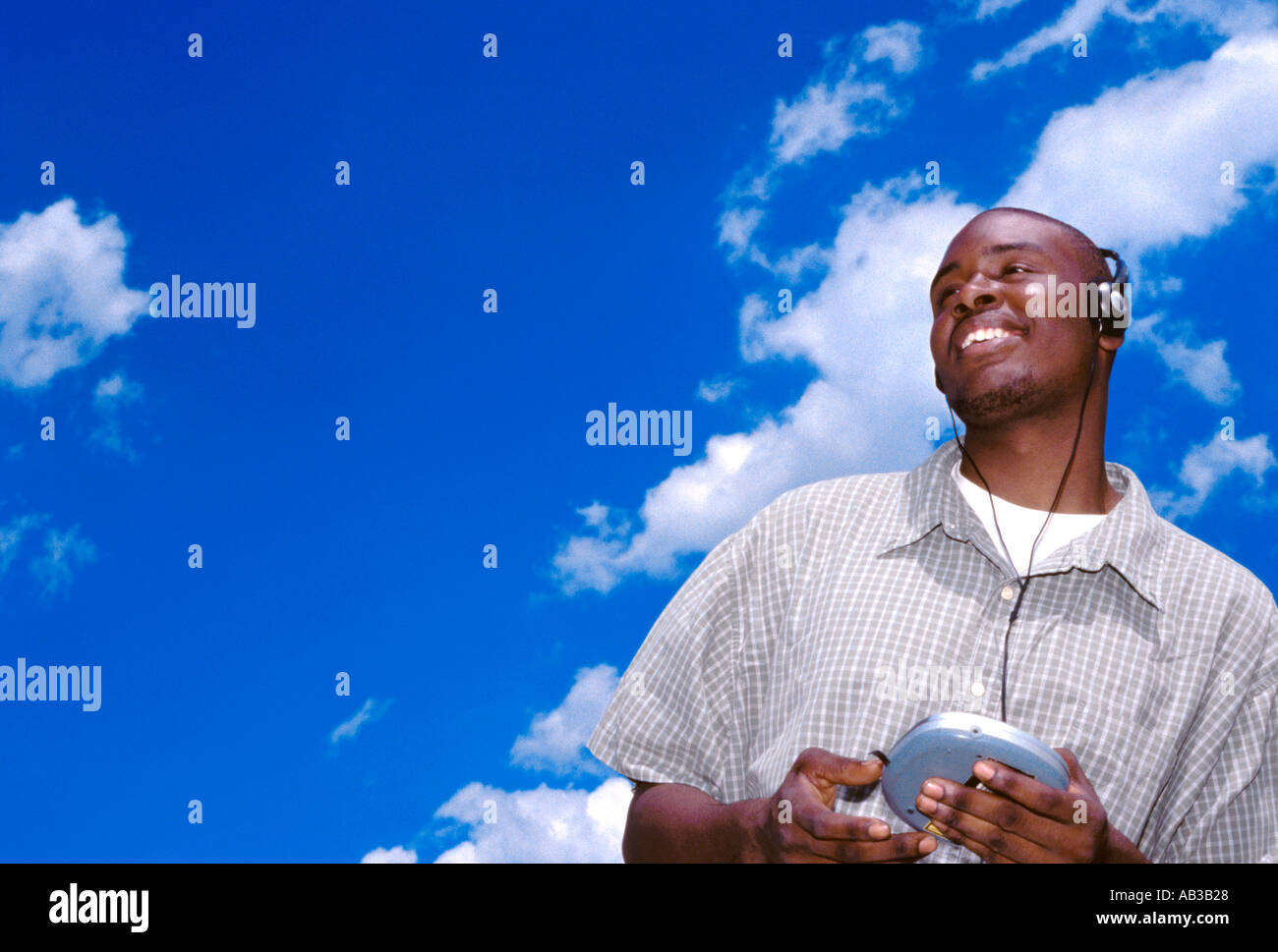 Portrait of a man outside during summer Stock Photo - Alamy