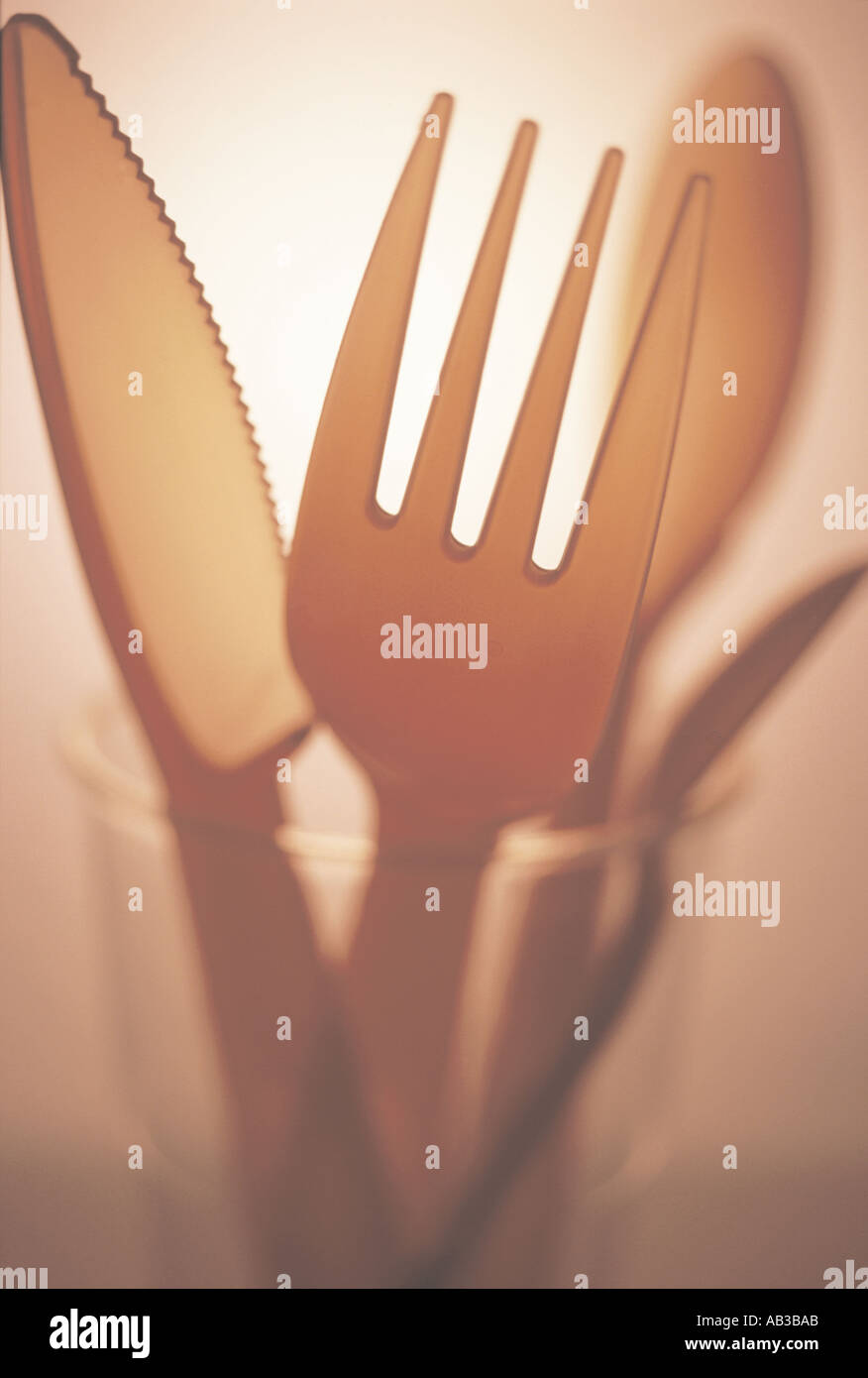 Plastic Forks and Knives in Holder Stock Photo - Alamy