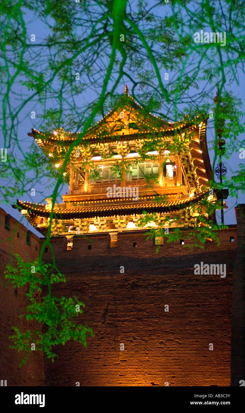Pingyao watchtower at night on ancient rammed earth wall of 2,700 year ...