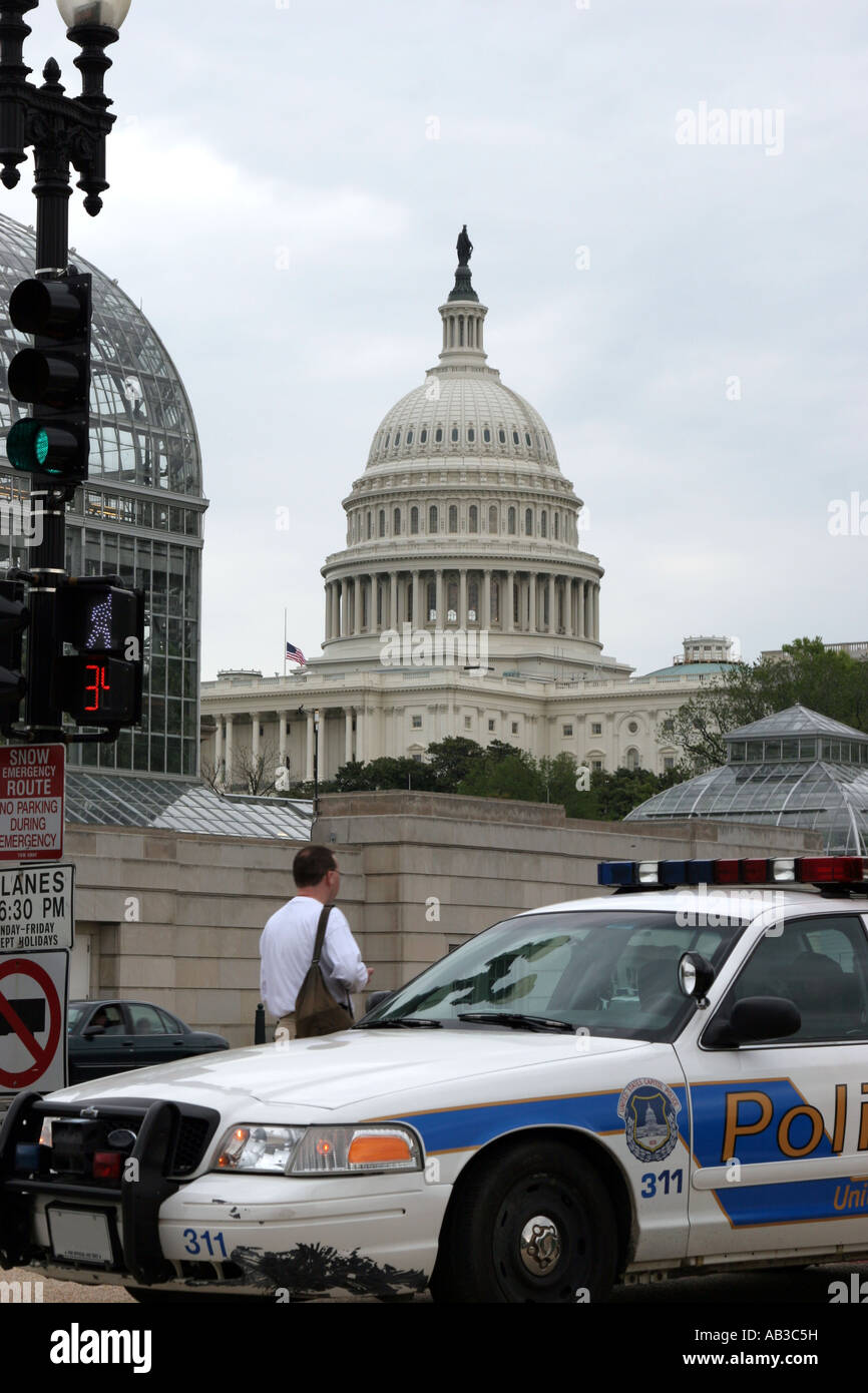 US Capitol building with police car in foreground, Washington, DC, USA ...