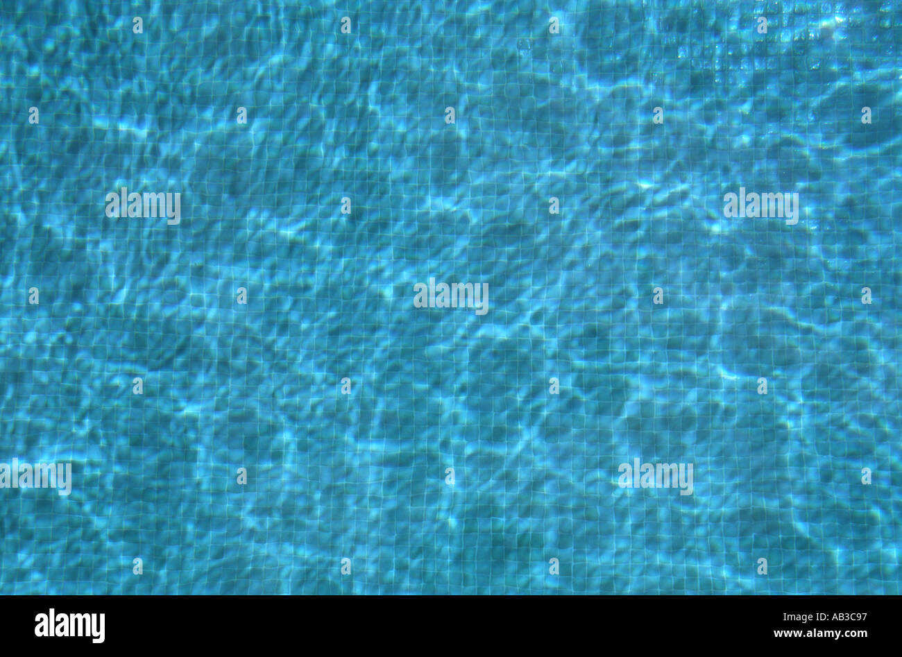 Swimming pool with ripples in spain Stock Photo - Alamy