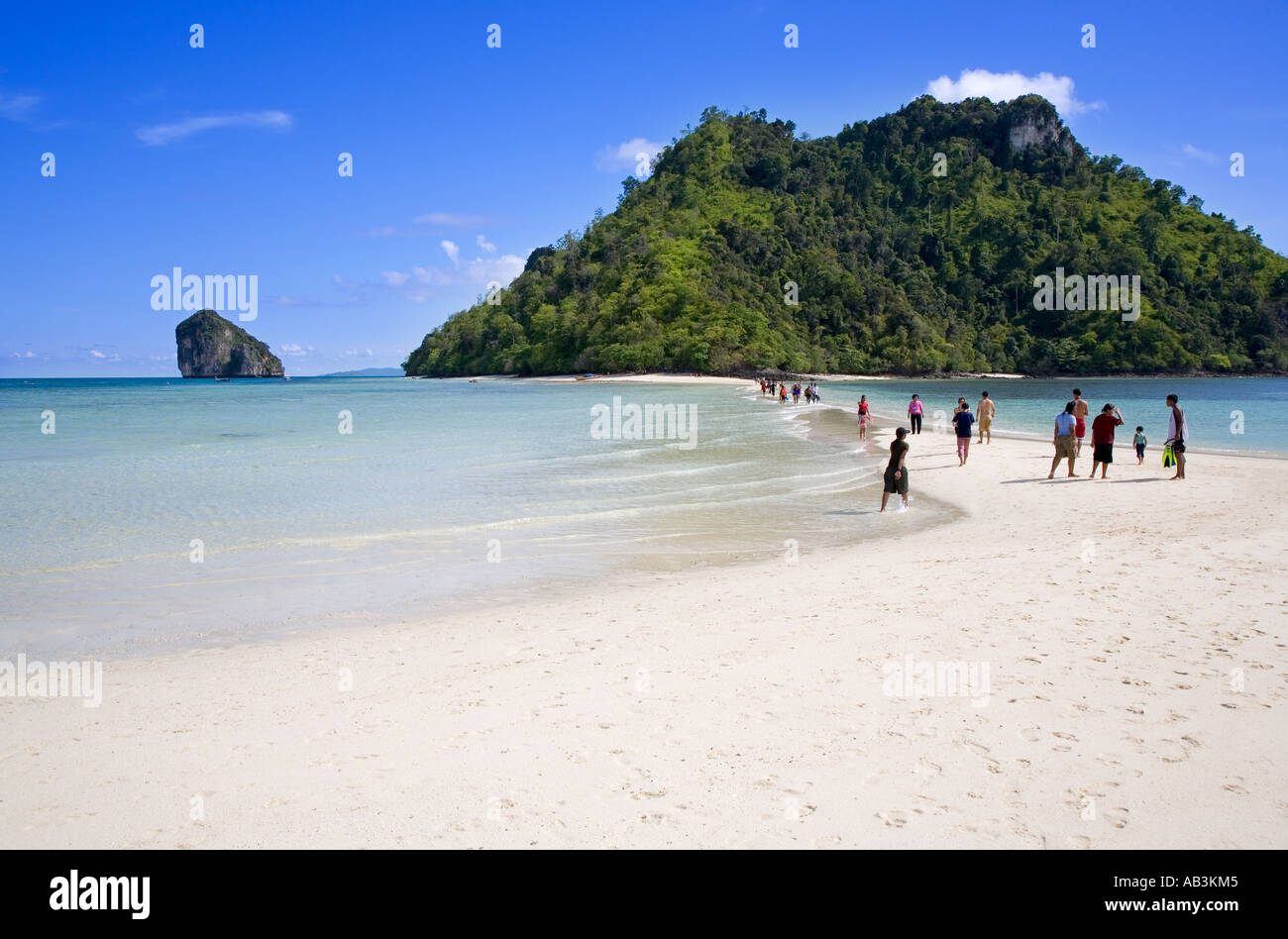 Beach walking at ebb tide Stock Photo - Alamy