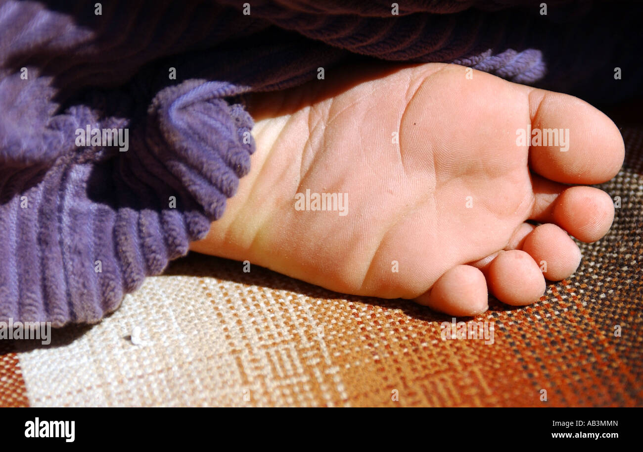 A child's foot Stock Photo - Alamy