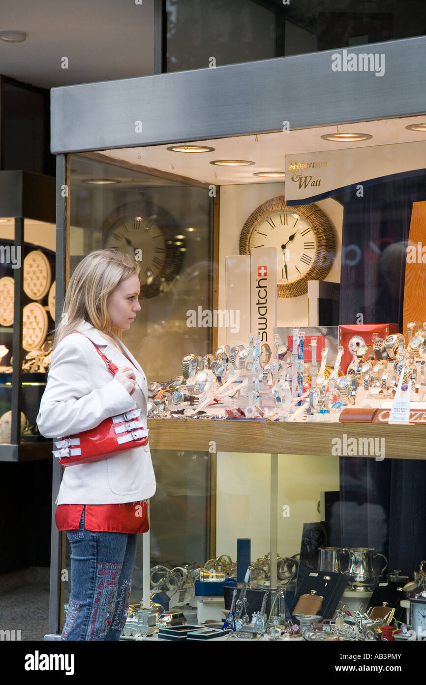 Window shopping. Woman shopper outside jewellerys shop, Dundee Scotland ...