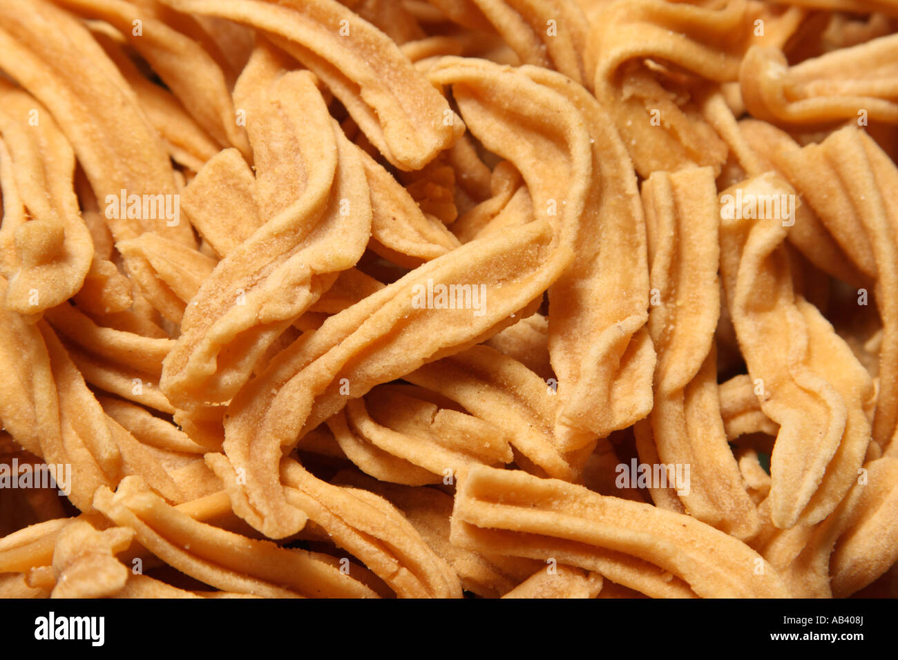 twisted shaped snack Stock Photo - Alamy