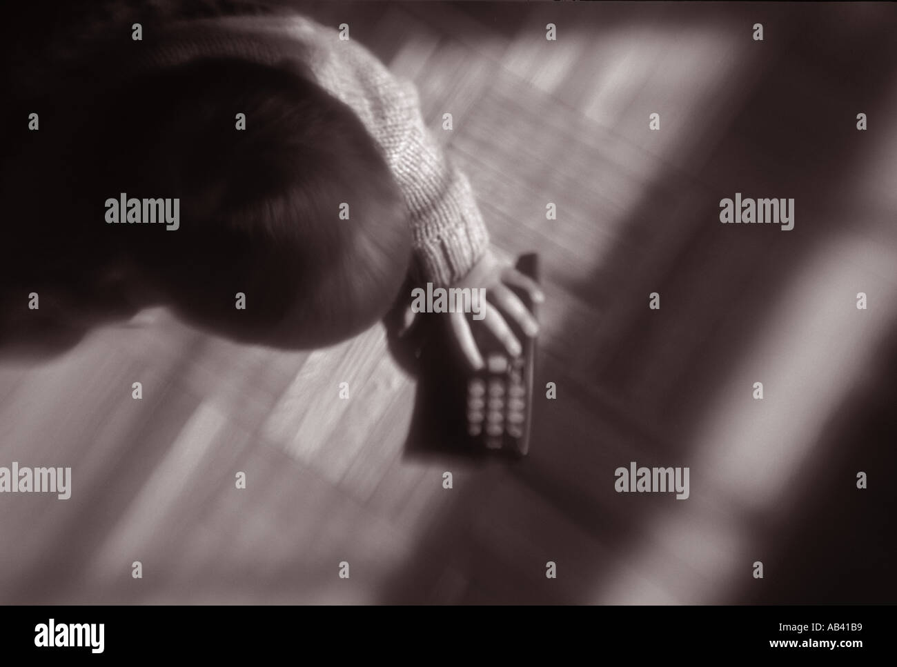 Baby boy playing tv remote hi-res stock photography and images - Alamy