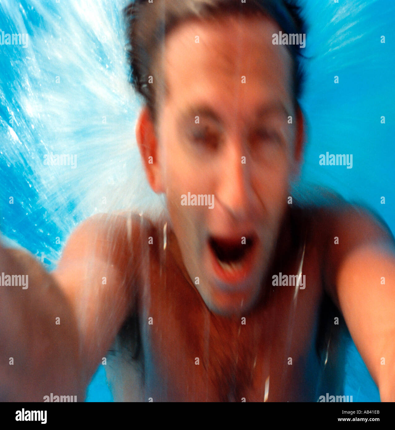 Man falling into swimming pool Stock Photo - Alamy