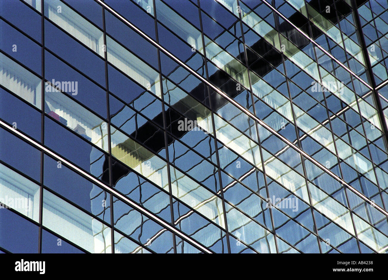 Reflections on a glass fronted building in Cardiff Wales Stock Photo ...