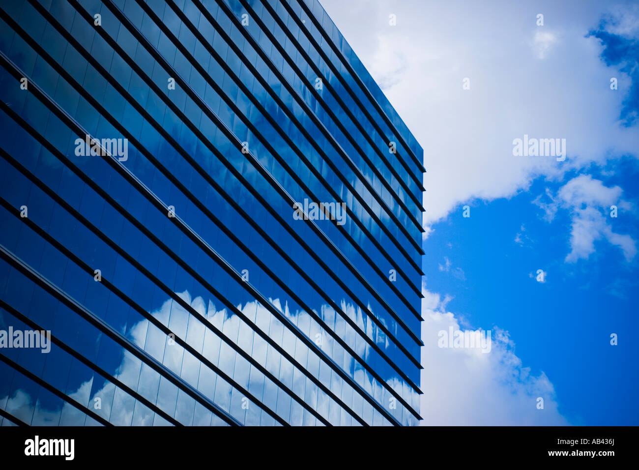 Modern corporate building with a sky as background Stock Photo - Alamy